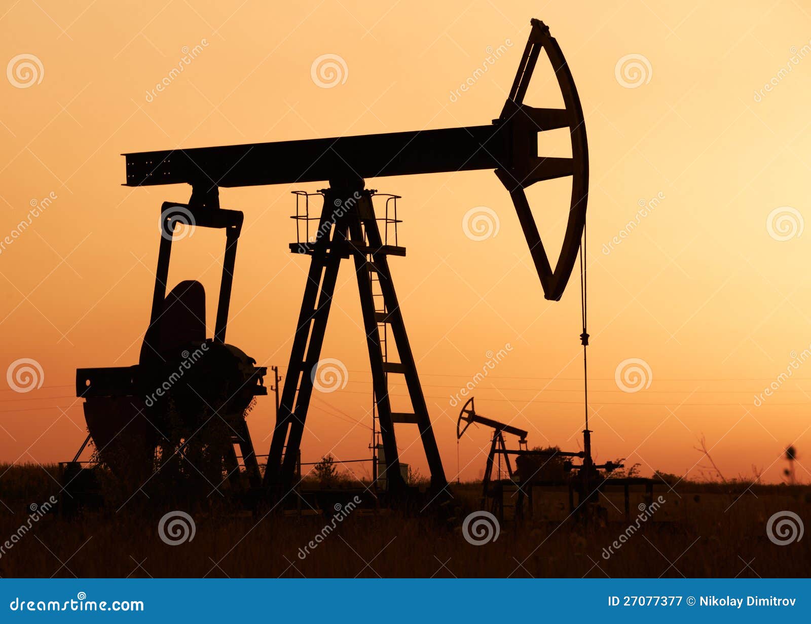 Oil pump at sunset stock image. Image of pumpjack, power - 27077377