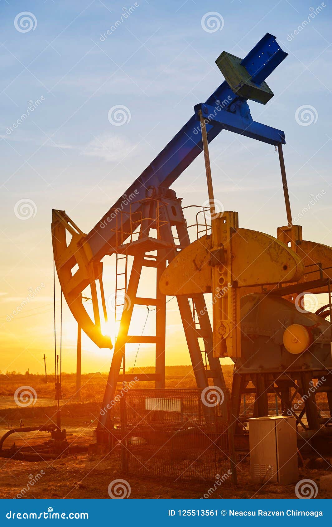 Oil pump at sunset/sunrise editorial photo. Image of generation - 125513561