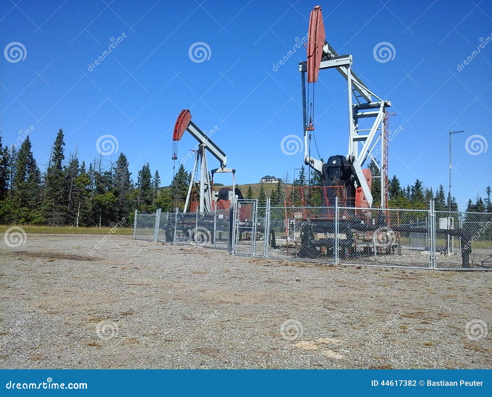 Oil Pumpers stock photo. Image of ground, pumping, trees - 44617382