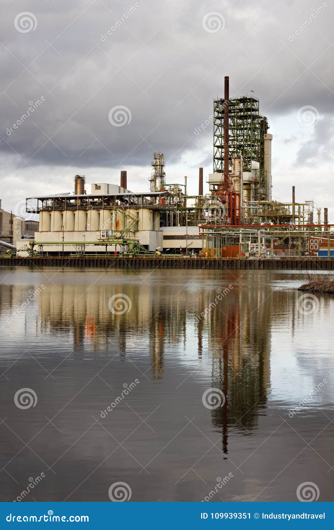 Oil Refinery at Canal stock image. Image of generation - 109939351
