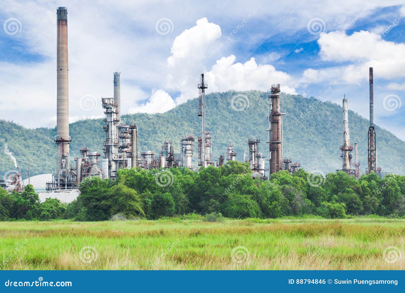 Oil Refinery with Green Field Stock Photo - Image of chimney, metal ...
