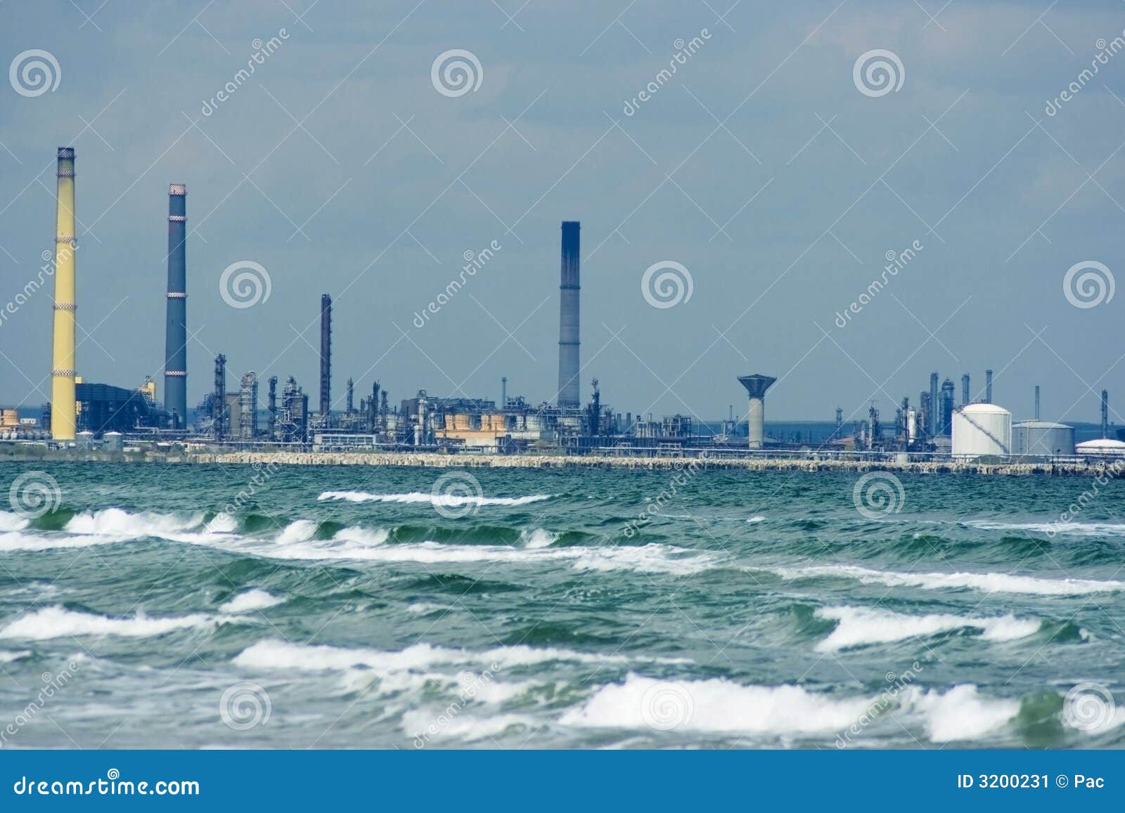 Oil refinery at sea stock image. Image of factory, fumes - 3200231