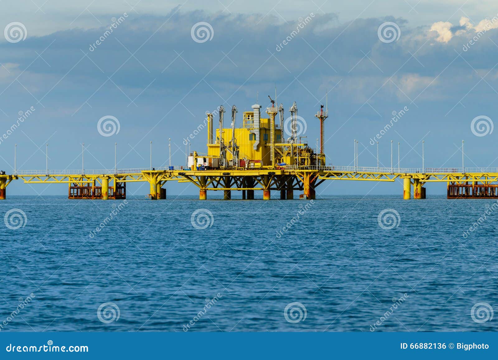 Oil refinery into the sea stock photo. Image of industrial - 66882136