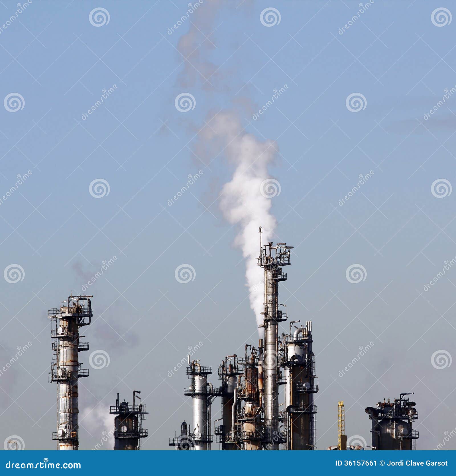 Oil refinery smoke stacks stock image. Image of blue - 36157661
