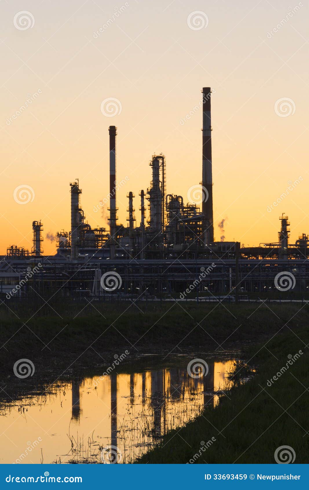 An oil refinery at sunset stock image. Image of night - 33693459