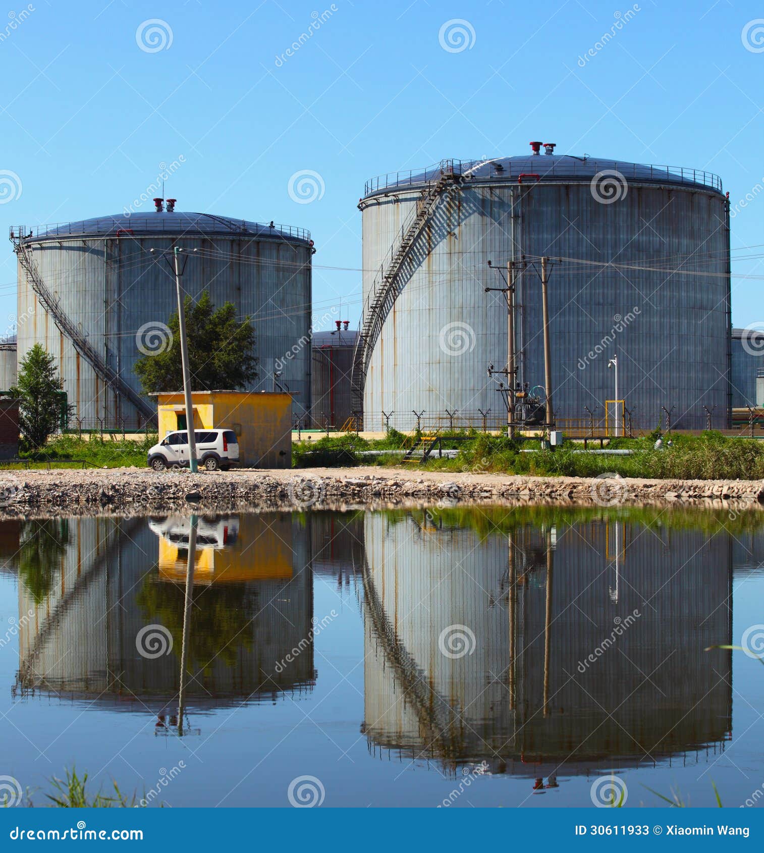 Oil Refinery Tanks stock image. Image of smog, environment - 30611933
