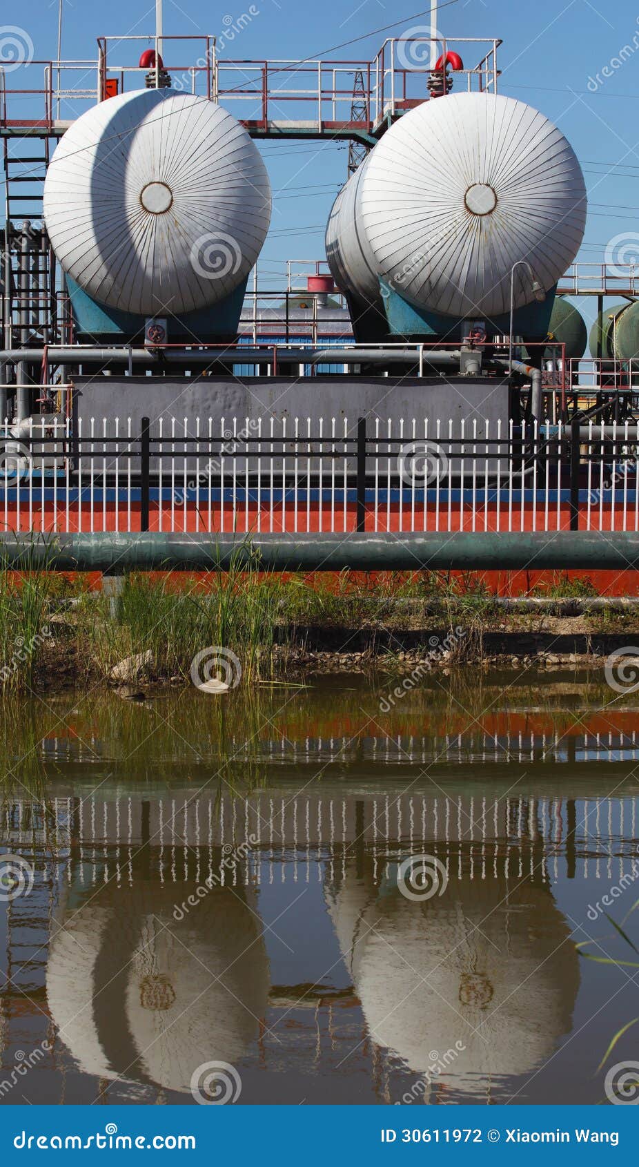 Oil Refinery Tanks stock photo. Image of environment - 30611972