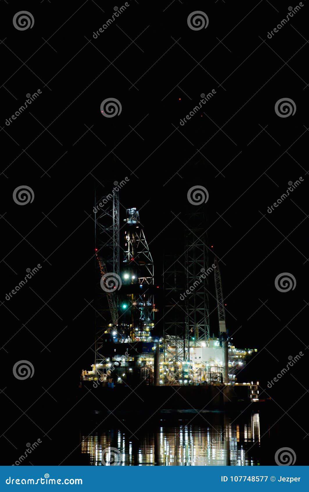 Oil Rig at Night with Water Reflection Stock Image - Image of petroleum ...