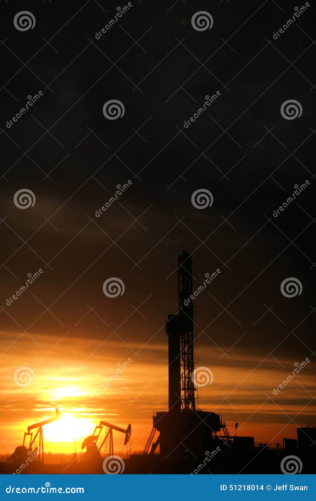 Oil rig in the sunset stock photo. Image of dusk, cloud - 51218014
