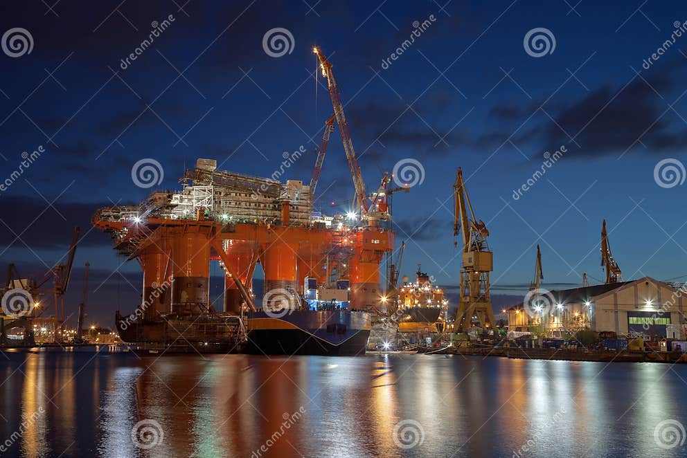 Oil rig in the yards stock image. Image of construction - 27891353