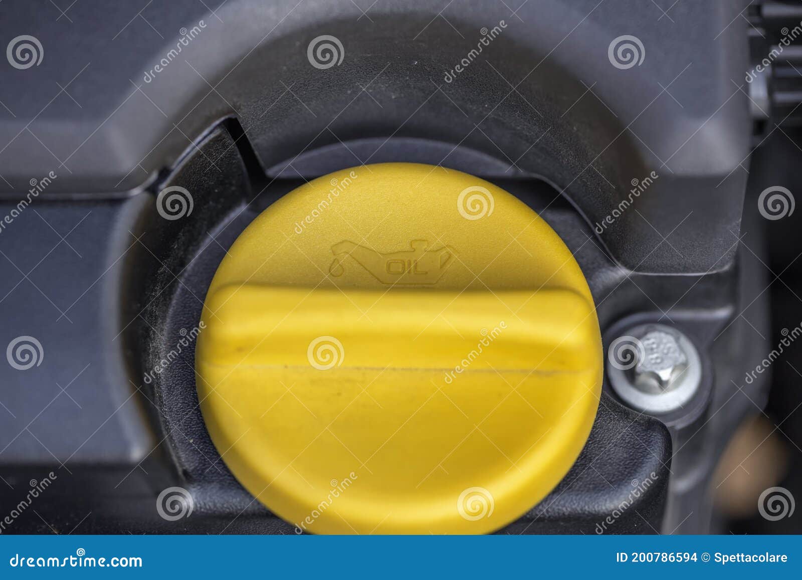 Oil sign on yellow oil cap stock photo. Image of maximum - 200786594