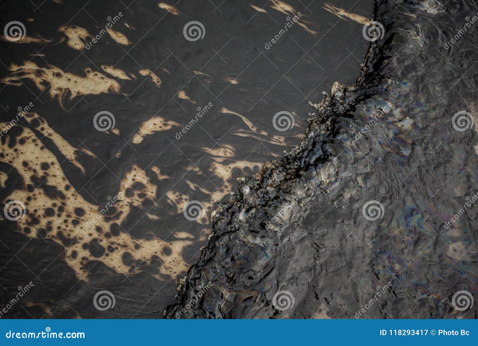Oil spill on beach stock image. Image of texture, travel - 118293417