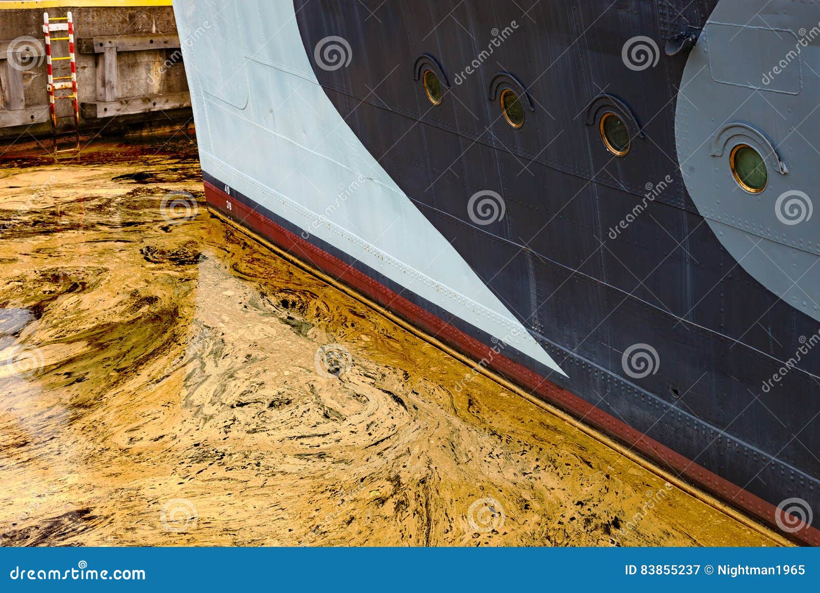 Oil spill on water stock image. Image of liquid, harbor - 83855237