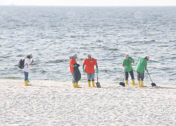 Oil Spill Workers at Seashore Editorial Image - Image of spill, mess ...