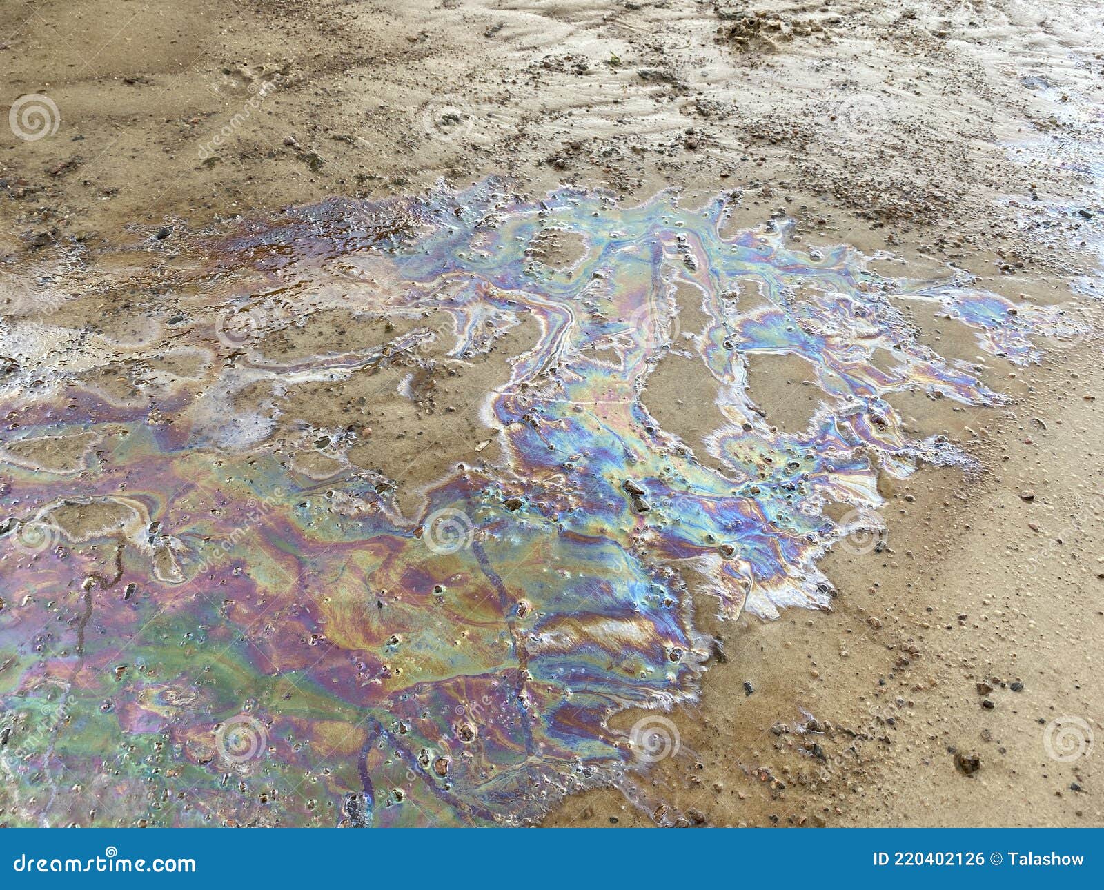 Oil spills on the sand stock photo. Image of ocean, sand - 220402126