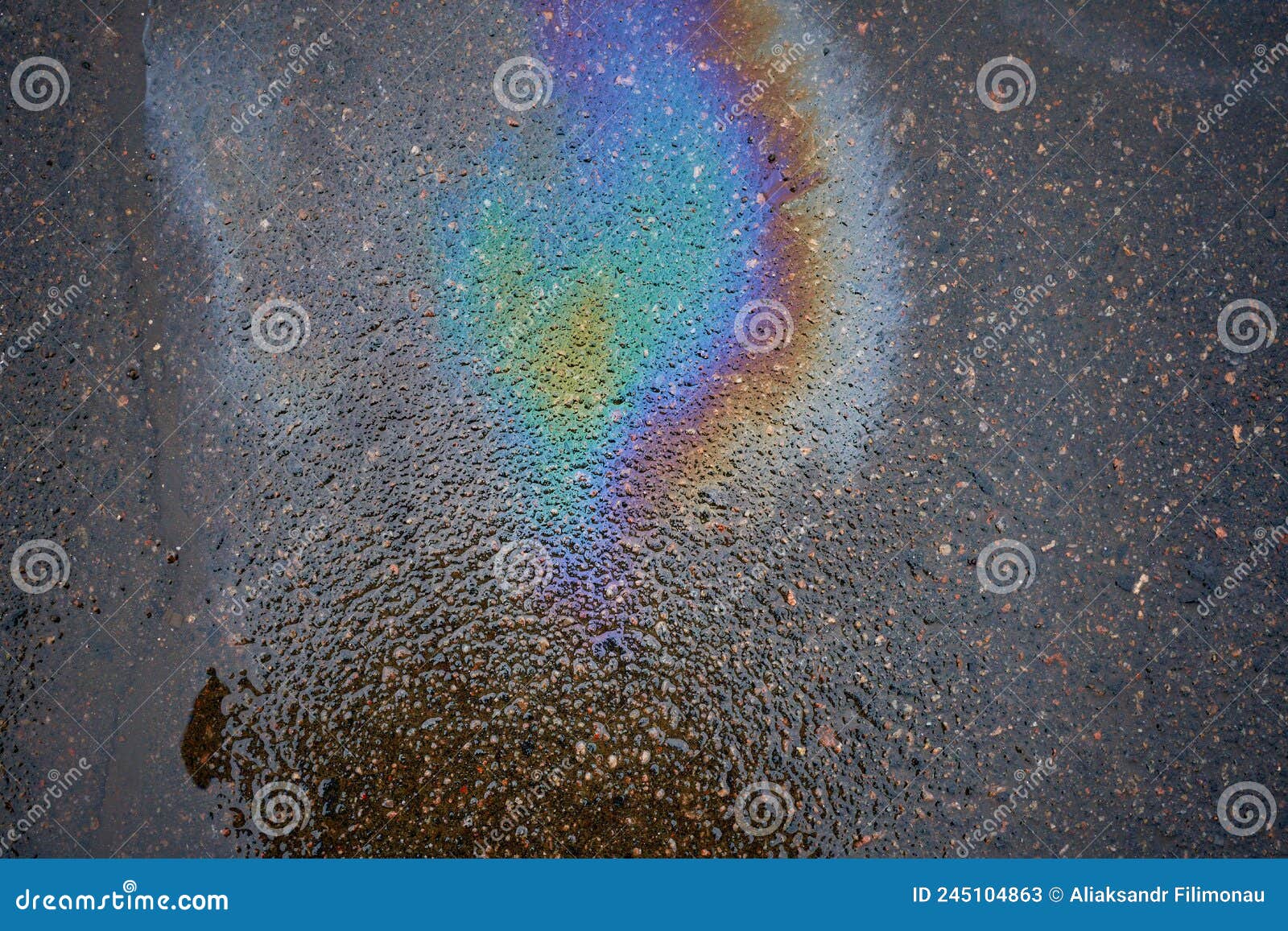Oil stain on wet pavement. stock image. Image of disaster - 245104863