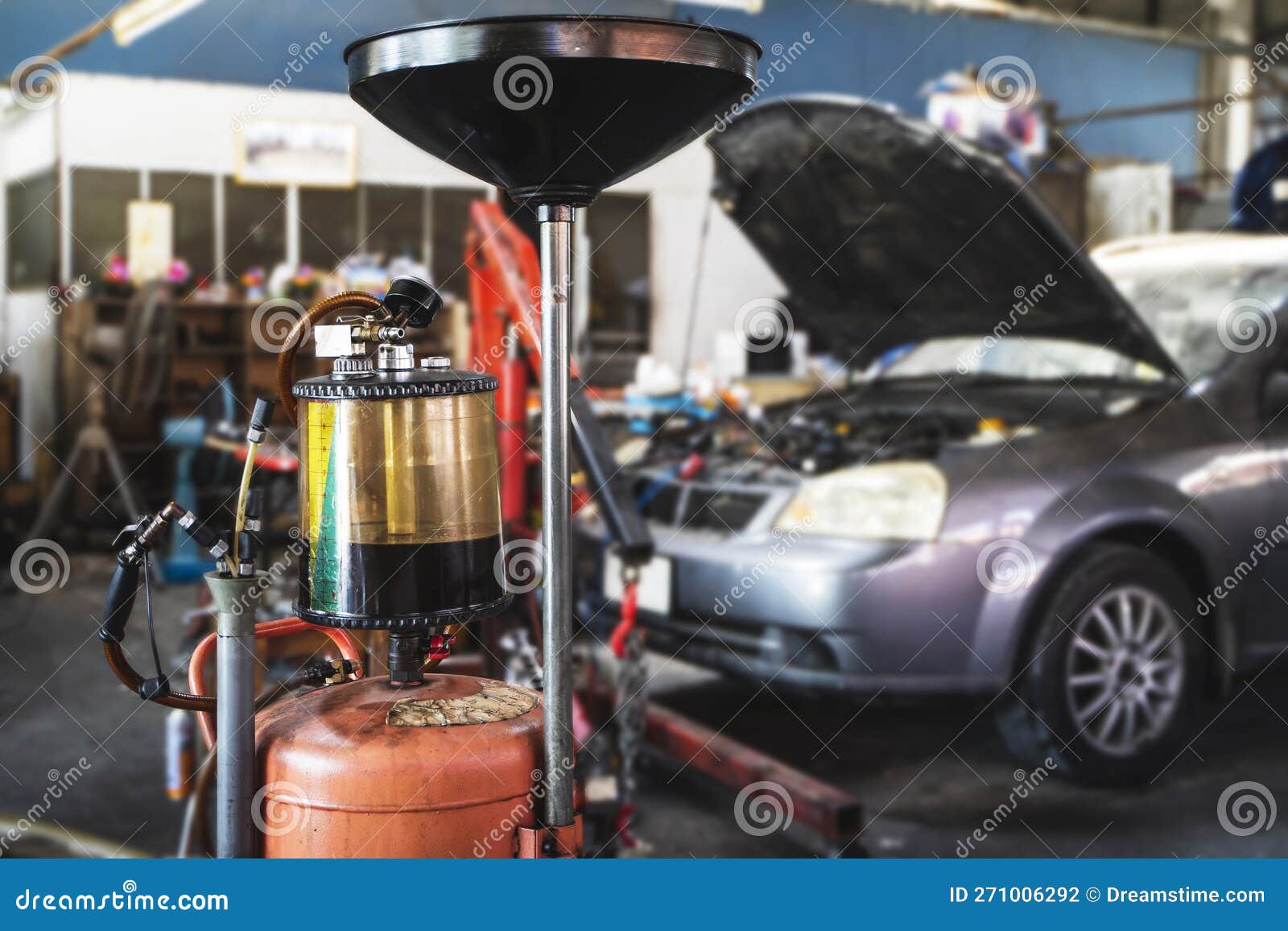 Oil Suction Machine in Garage Stock Photo - Image of industry, auto ...