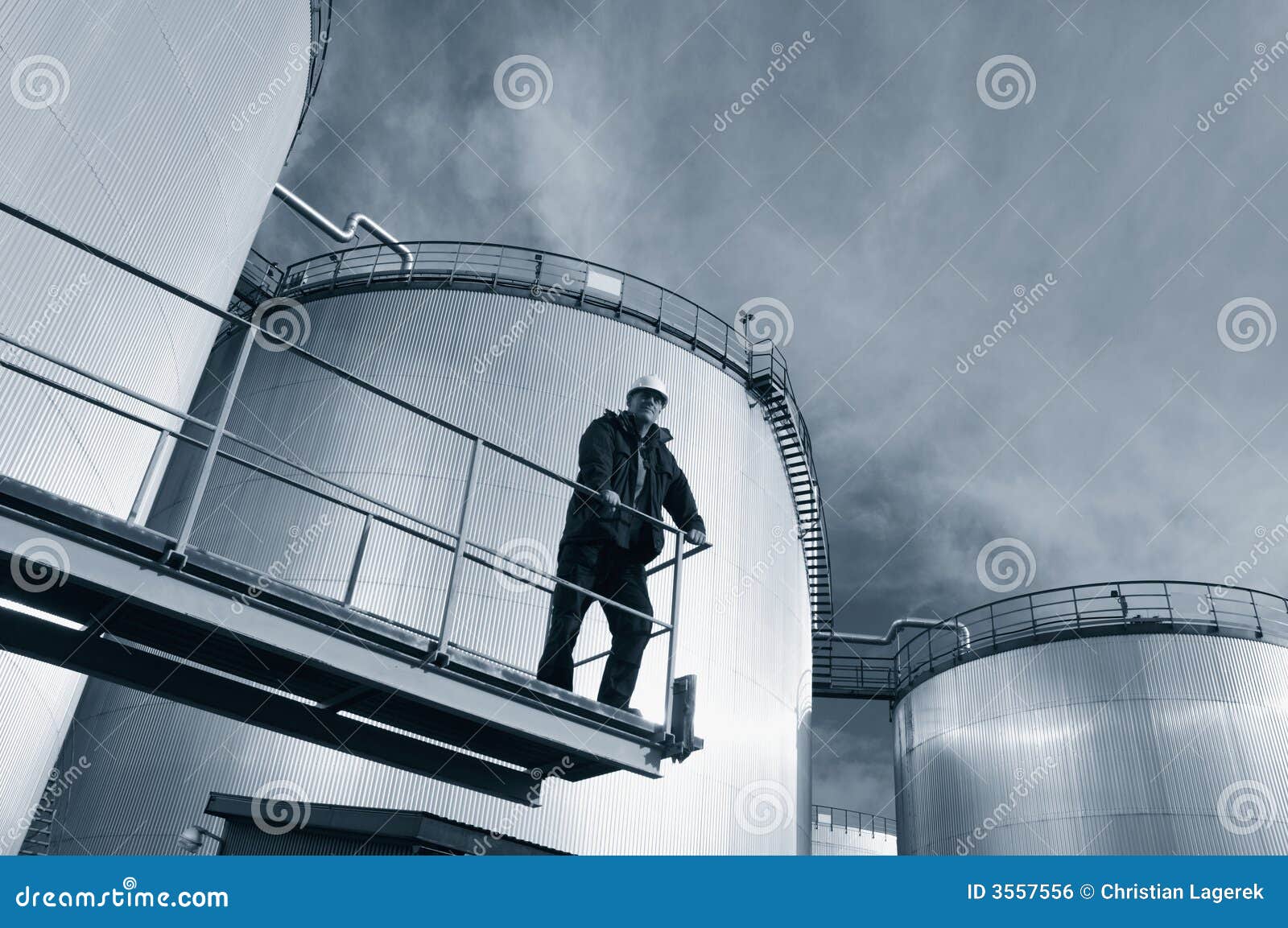 Oil tanks and engineer stock photo. Image of chemical - 3557556