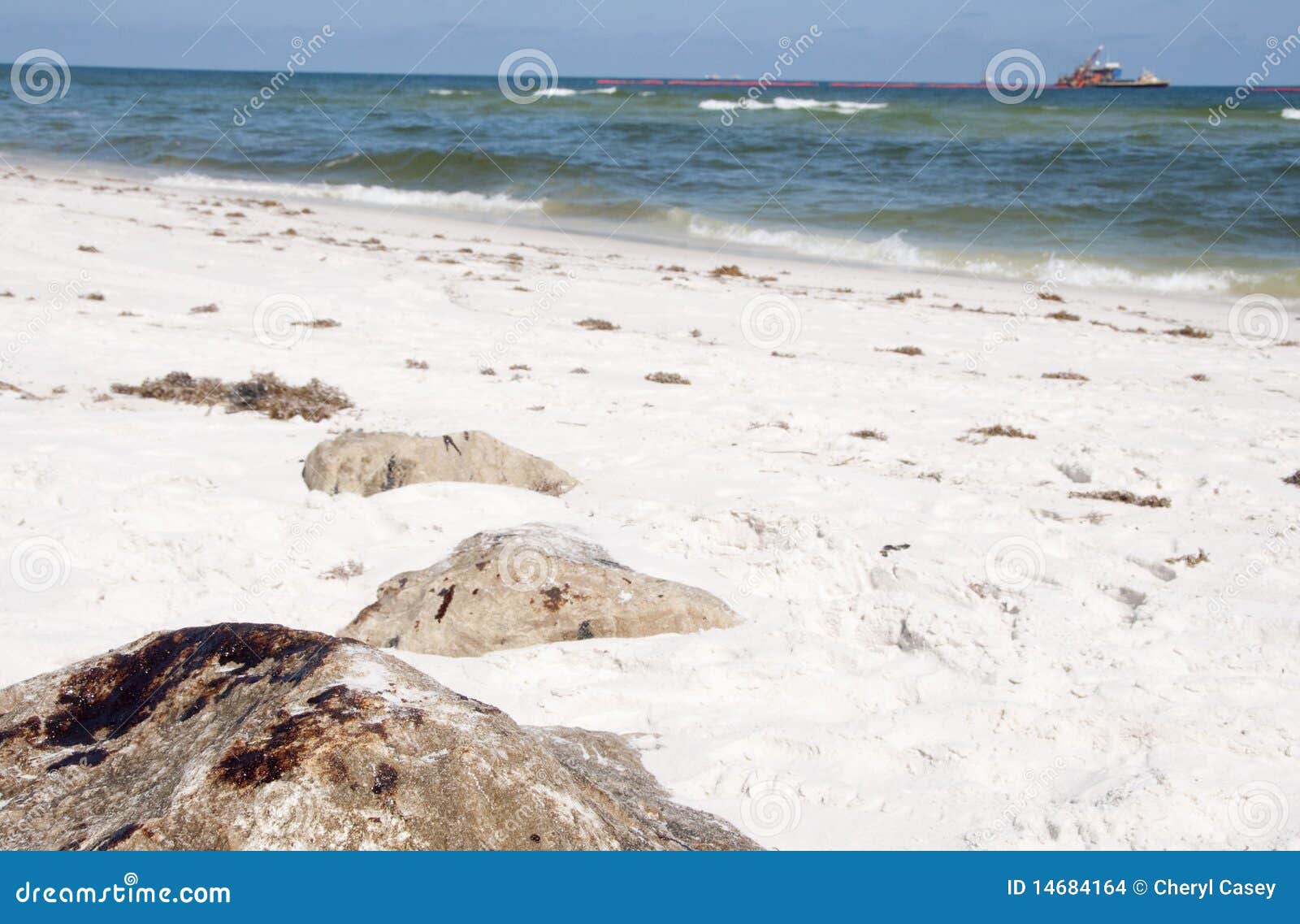 Oil washes ashore on beach editorial stock image. Image of natural ...