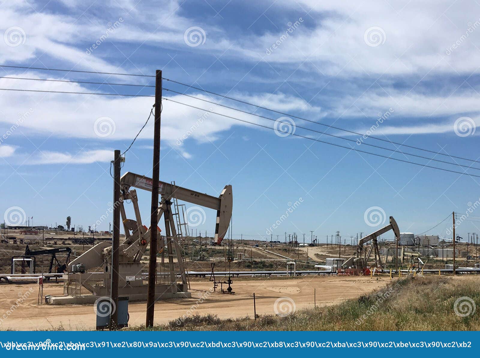 An Oil Well Pumps Crude Out of the Fields, California Editorial ... An Oil Well Pumps Crude Out of the Fields, California Editorial ...