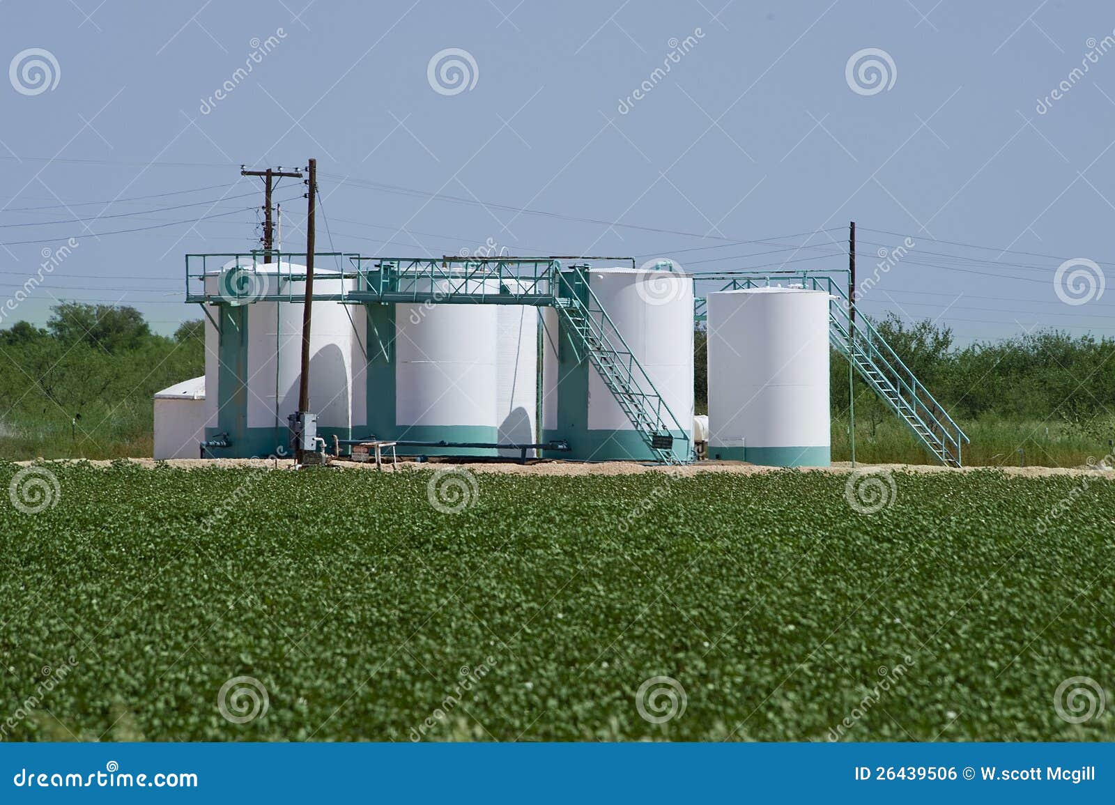 Oil Well Storage Tanks. stock photo. Image of petrochemical - 26439506