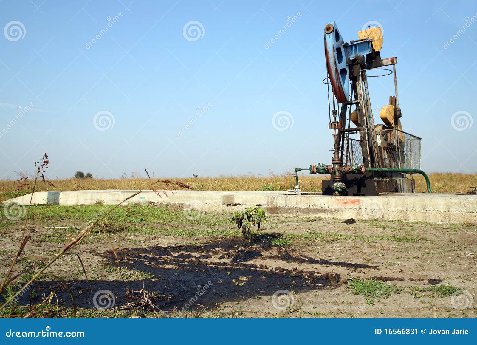 Oil wells with pollution stock image. Image of exploring - 16566831