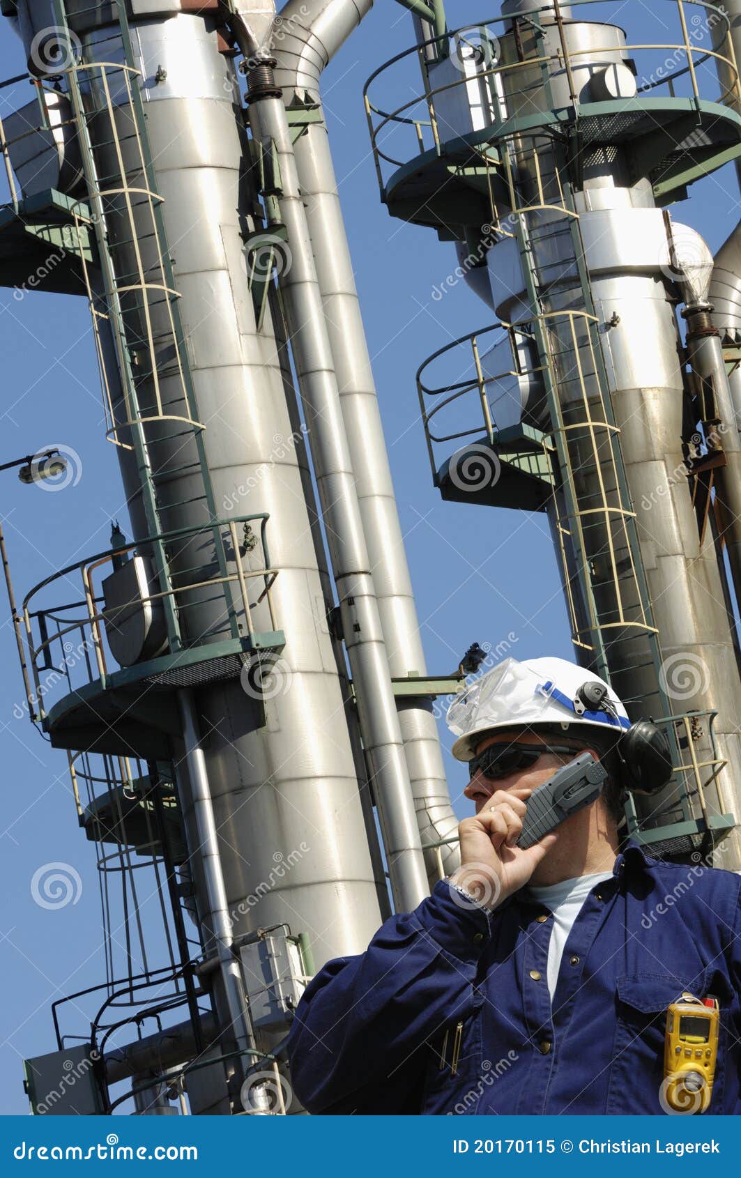 Oil worker and oil towers stock image. Image of environment - 20170115