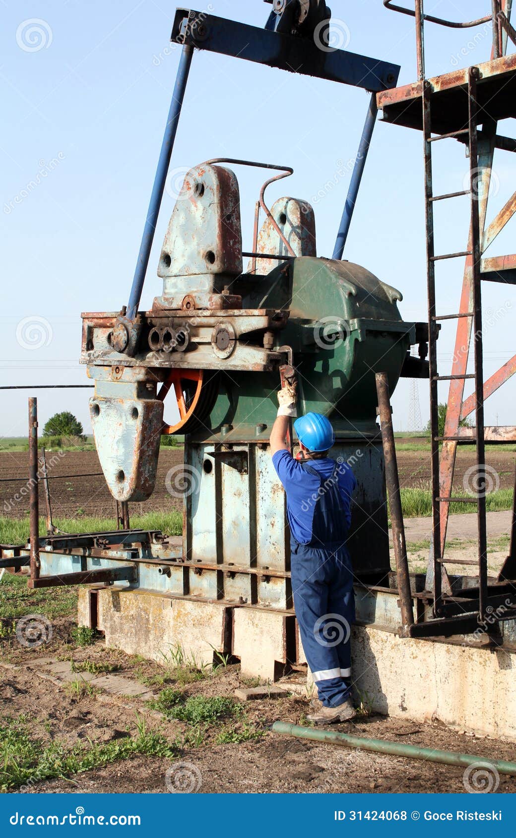 Oil Worker with Pipe Wrench Stock Photo - Image of outdoor, petroleum ...