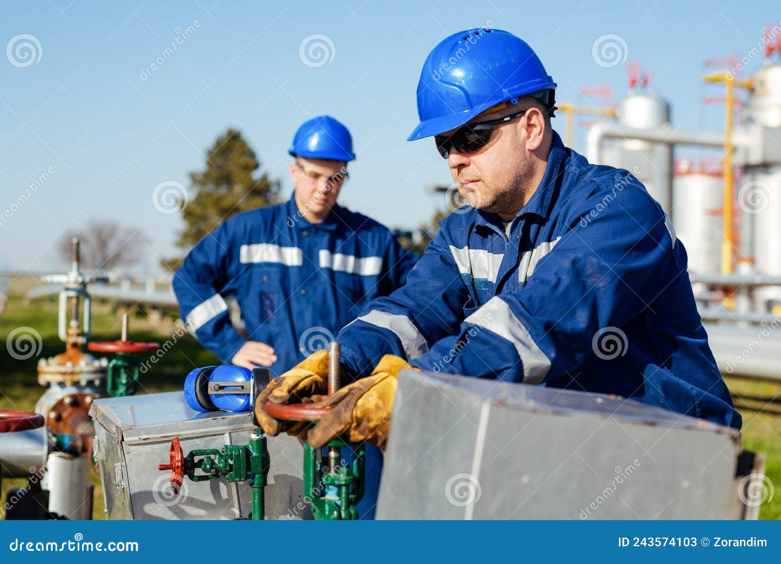 Oil Worker Turning Valve on Oil Rig Stock Image - Image of photogenic ...