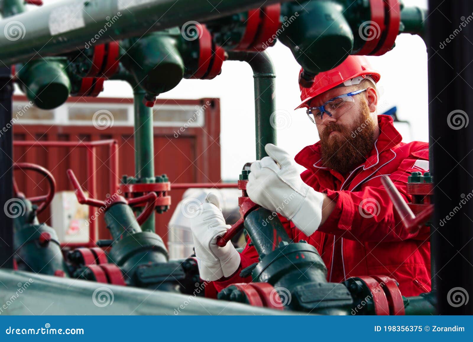 Oil Worker Turning Valve on Oil Rig Stock Image - Image of machinery ...