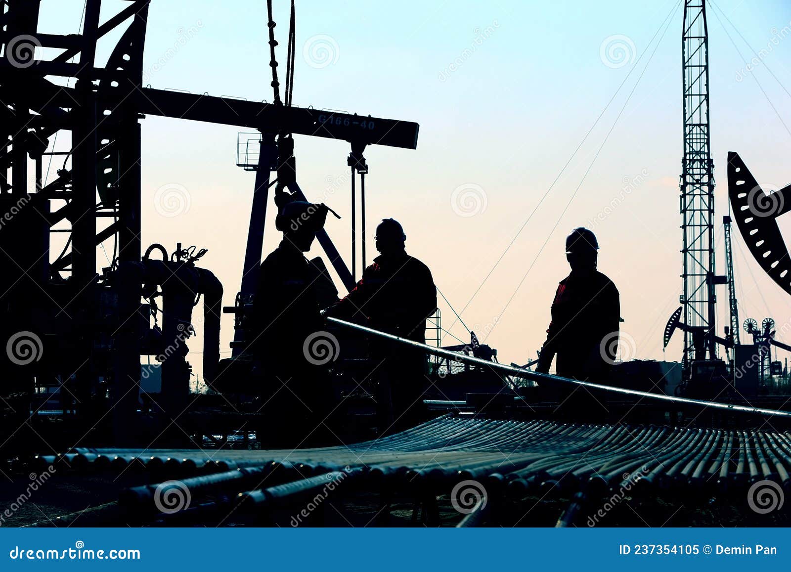 The oil workers at work stock image. Image of energy - 237354105