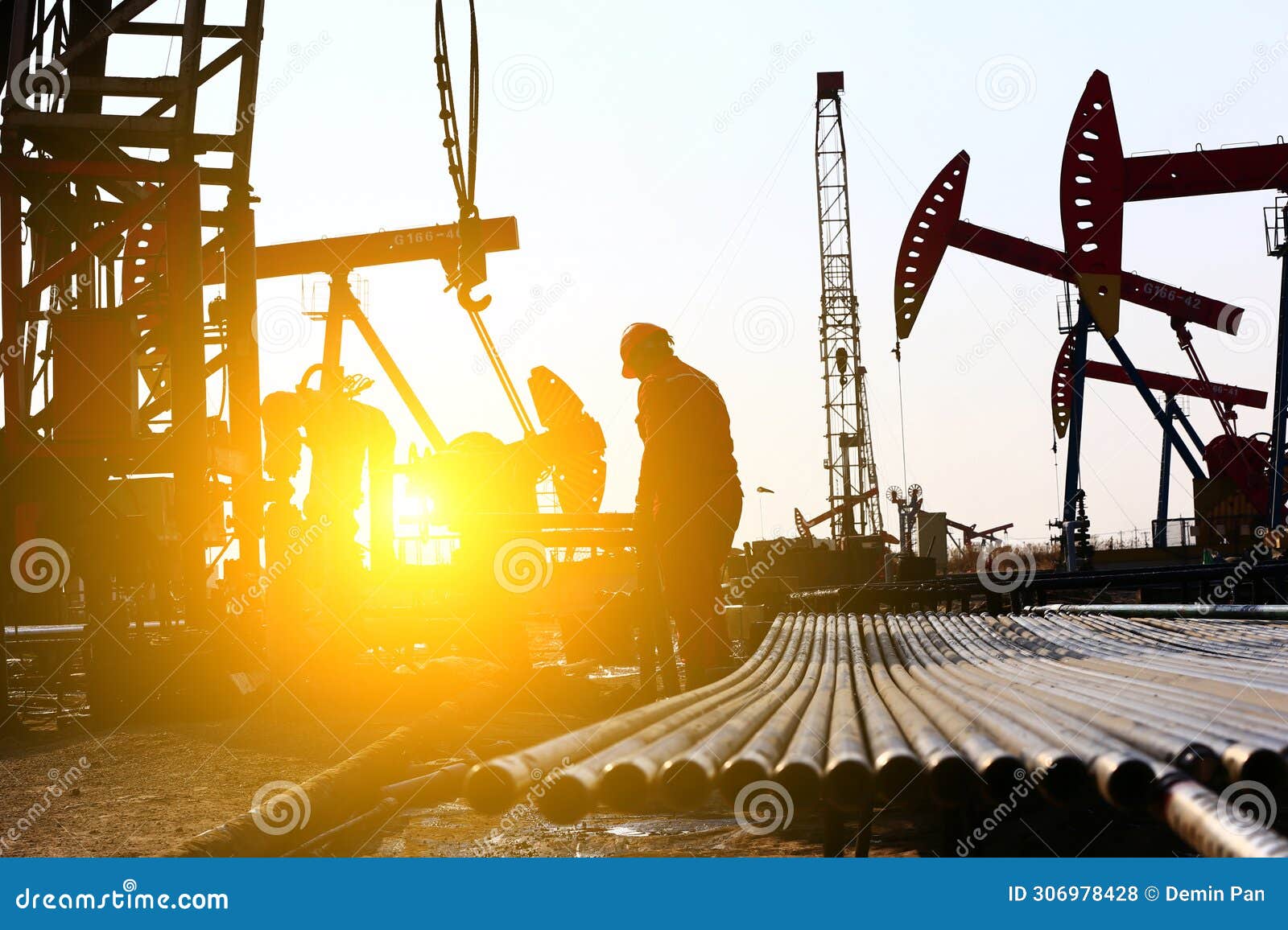 The oil workers at work stock photo. Image of profession - 306978428