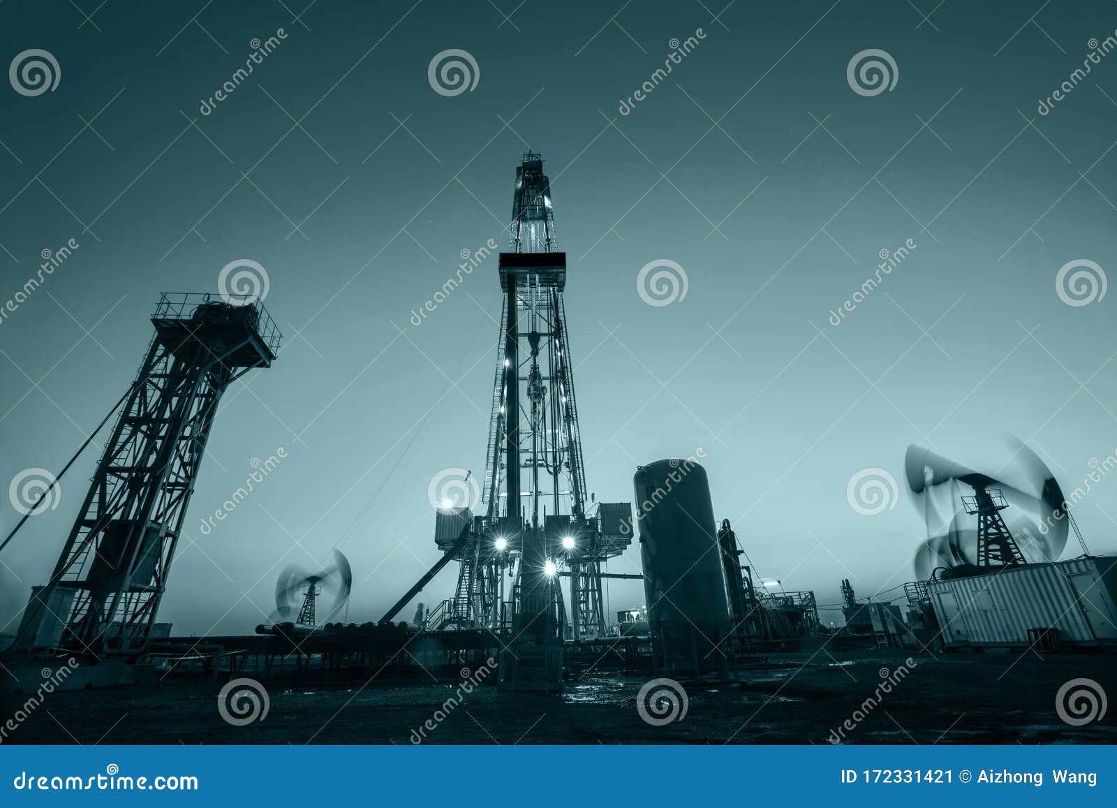 Oilfield derrick at night stock image. Image of night - 172331421