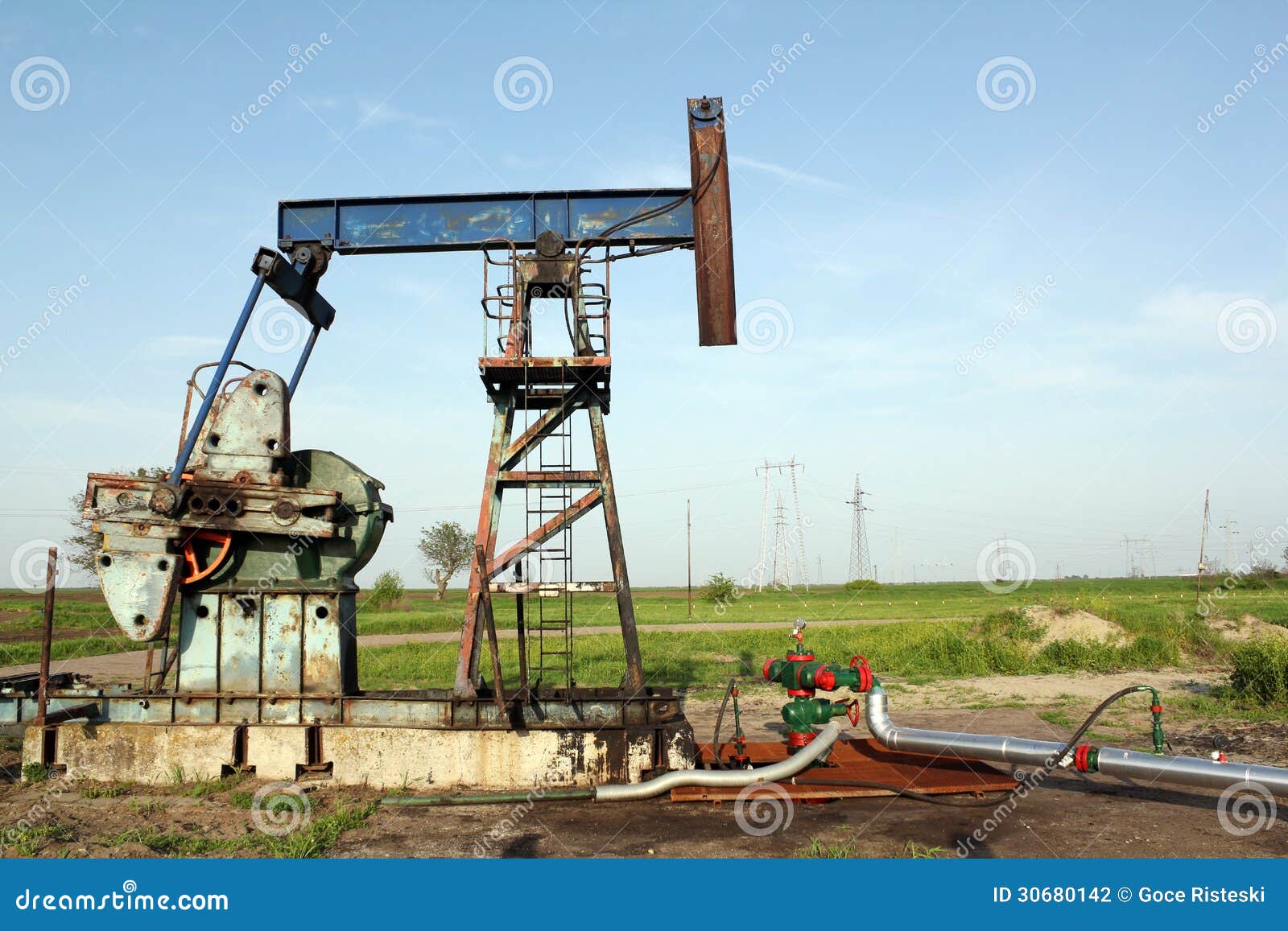 Oilfield with pump jack stock photo. Image of pump, green - 30680142
