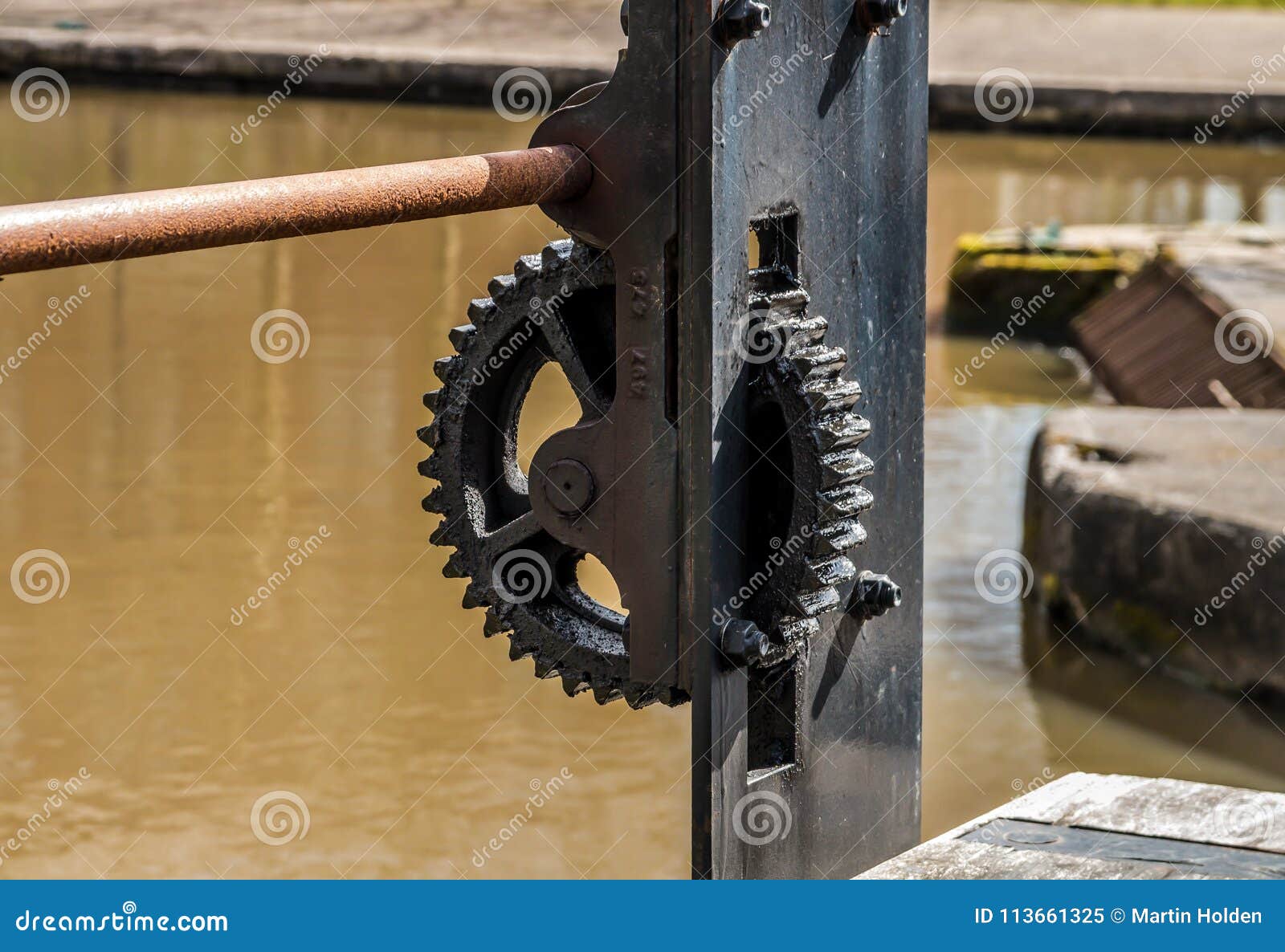 Oily Cog and Rusty Pole stock image. Image of engine - 113661325