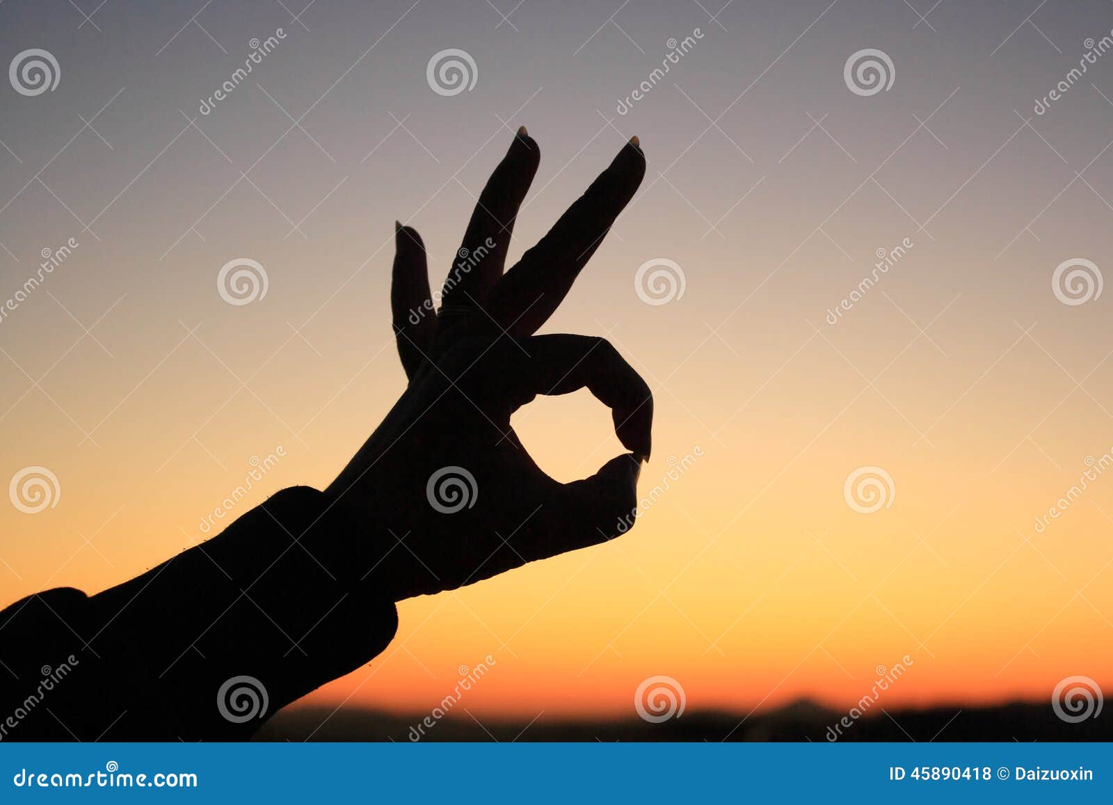 Ok hand sign silhouette stock photo. Image of orange - 45890418