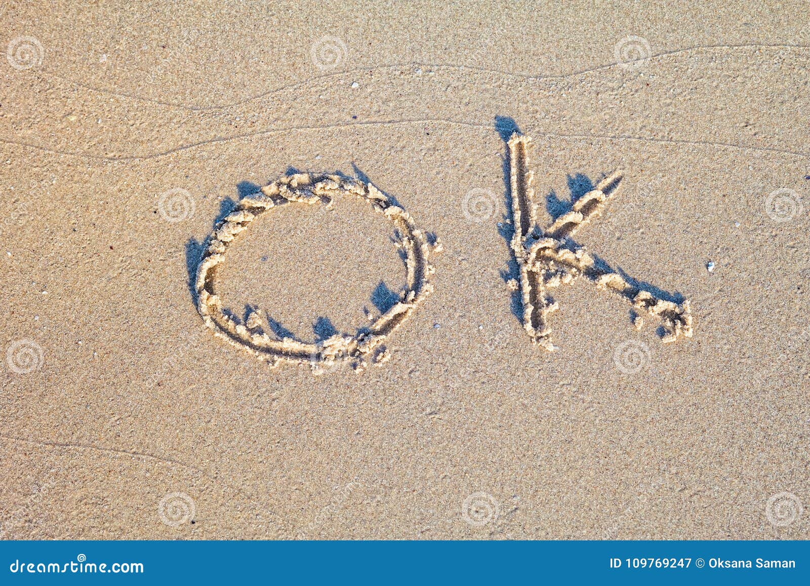 Ok written in the sand. stock image. Image of seashore - 109769247
