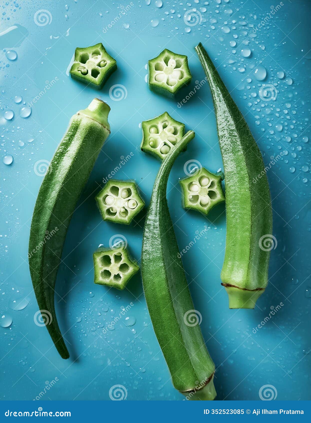 Okra Floating on Blue Clear Water with Glittering Droplets Stock Image ...