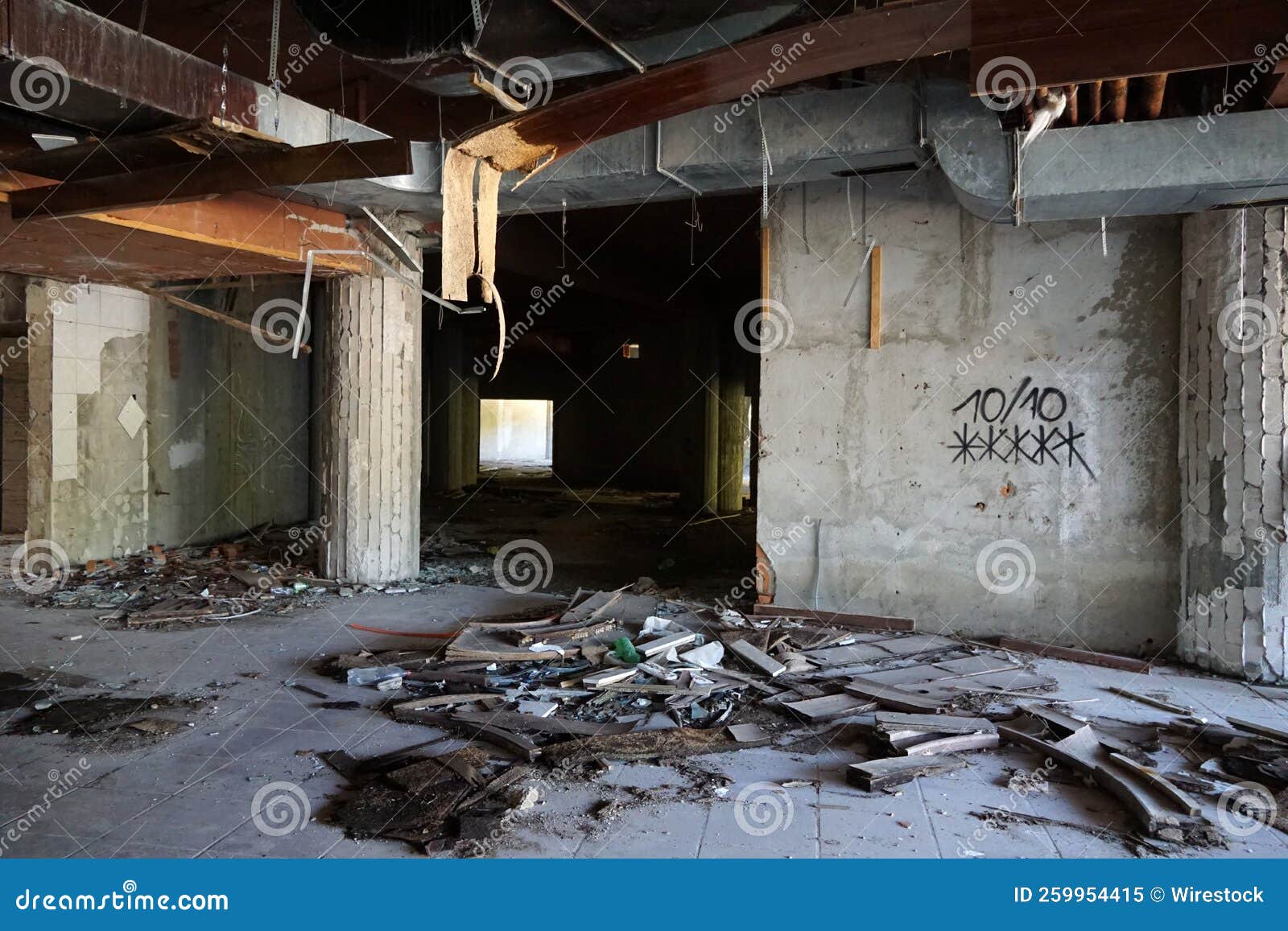 Old Abandoned Building Interior with Broken Ceiling and Woods on the ...