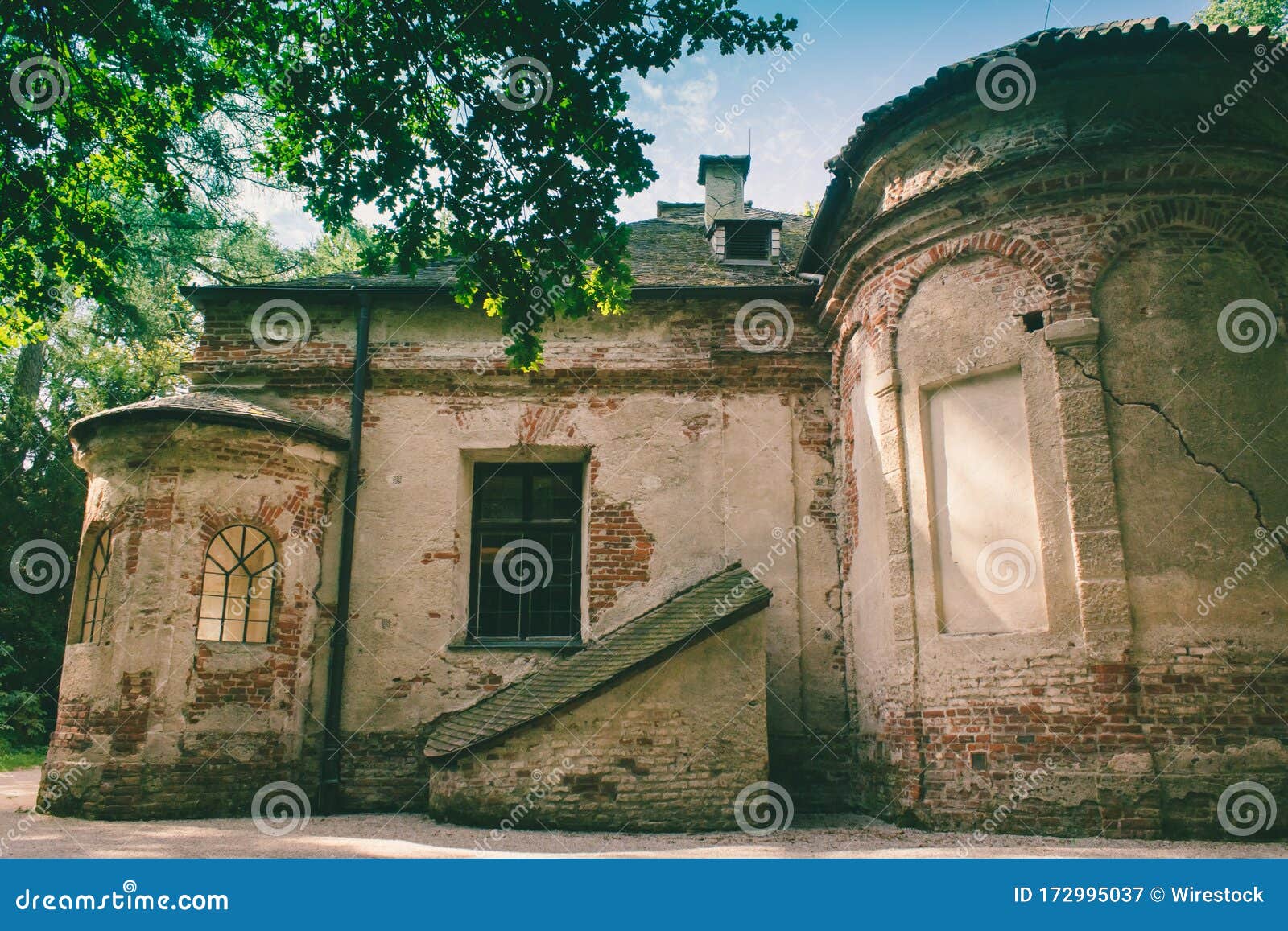 Old Abandoned Building Surrounded by Greenery Under the Sunlight and a ...