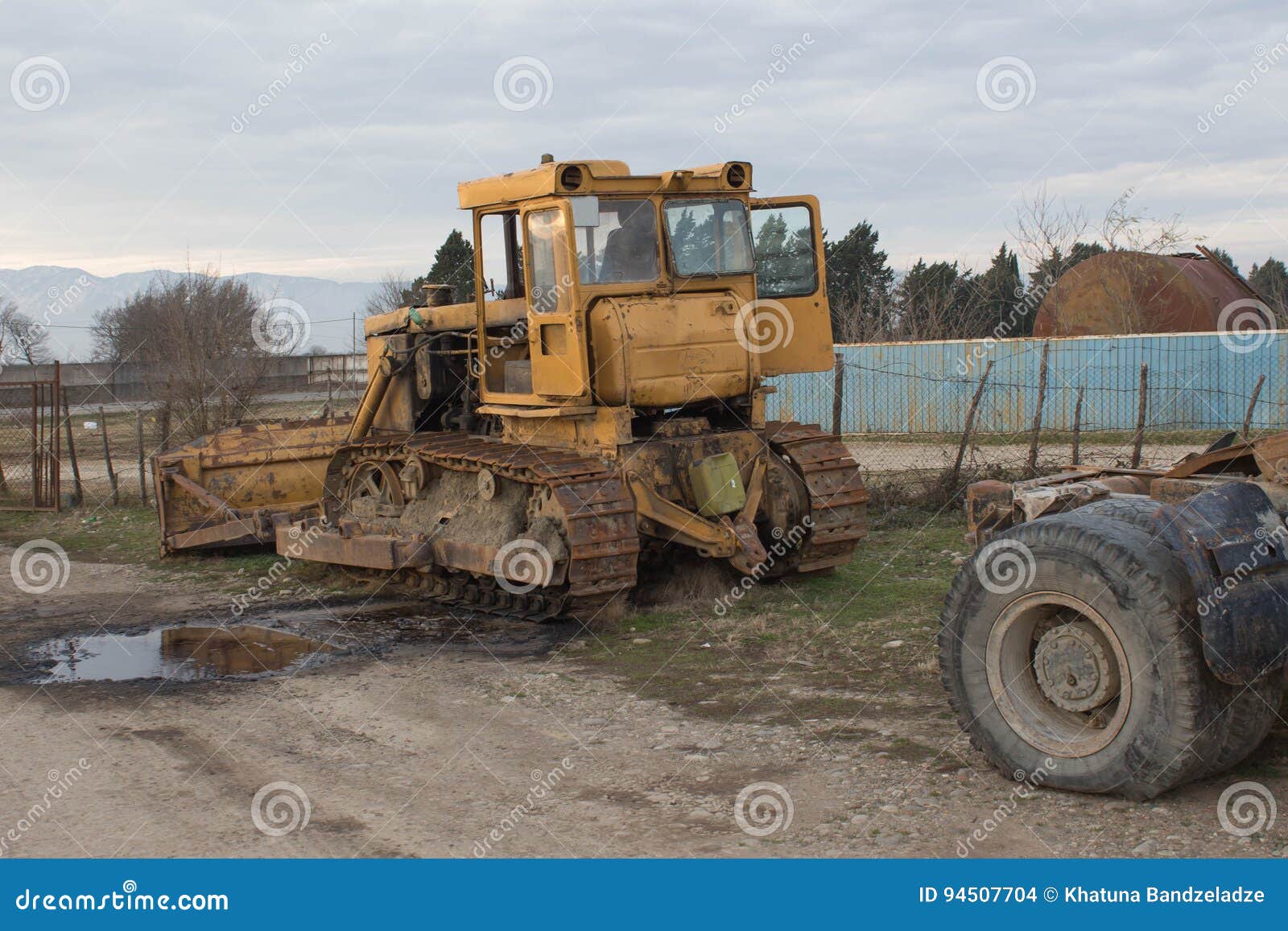 Old Abandoned Bulldozer. Old Rusty and Weathered Bulldozers Stock Photo ...