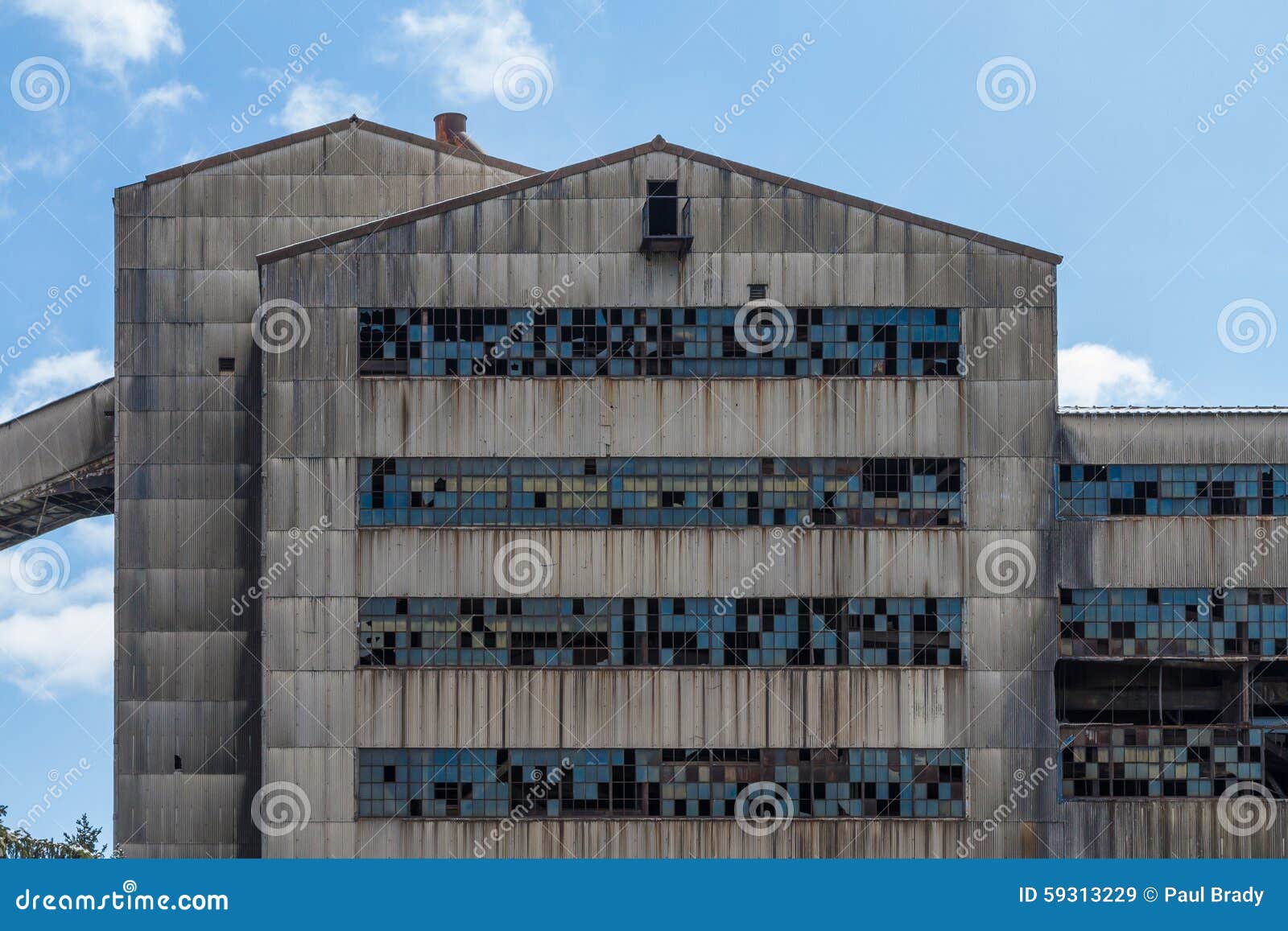 Abandoned Coal Power Plant With Broken Windows, Excess Coal And Worn ...