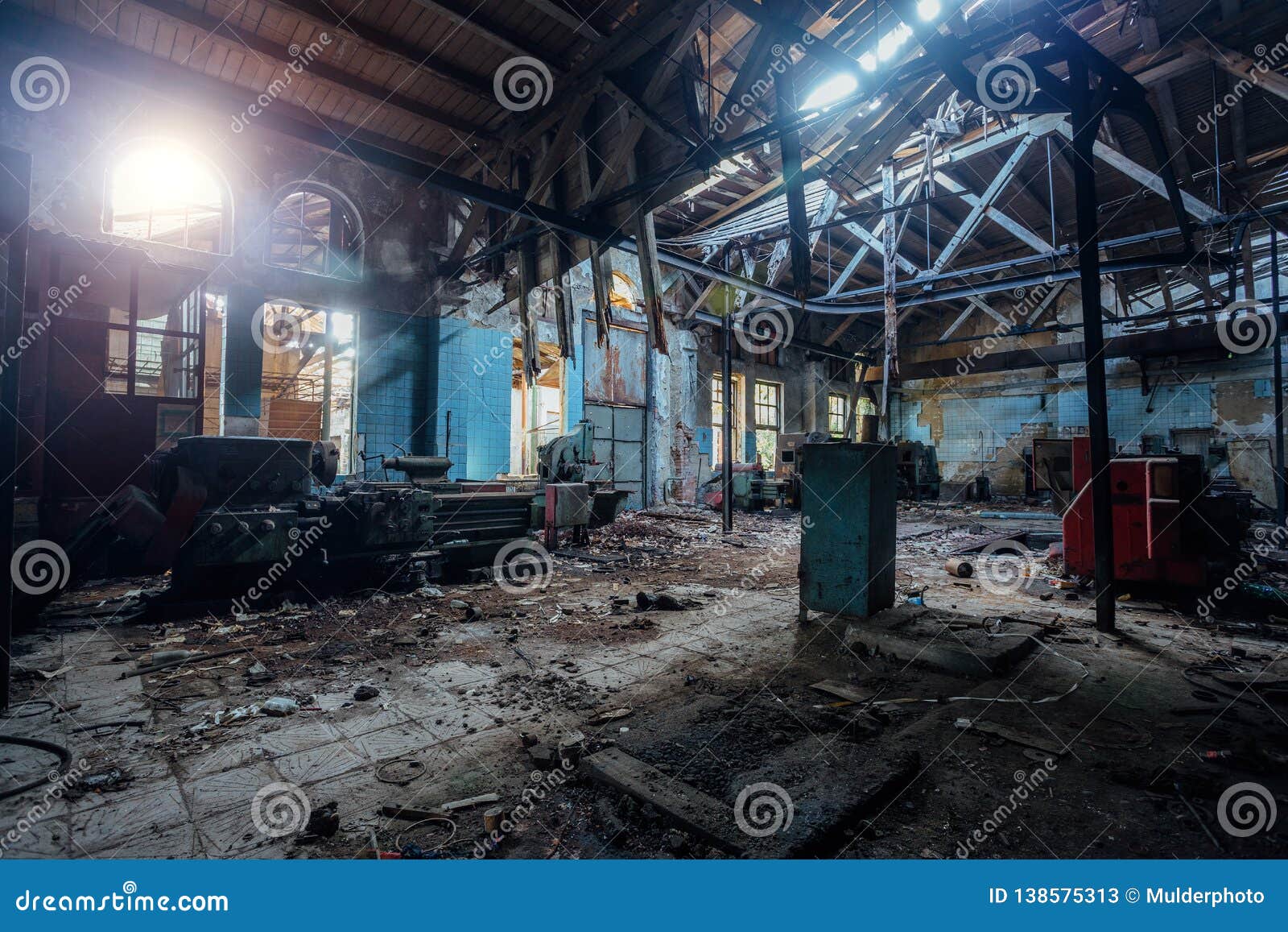 Old Abandoned Factory with Rusty Remains of Industrial Machine Tools in ...