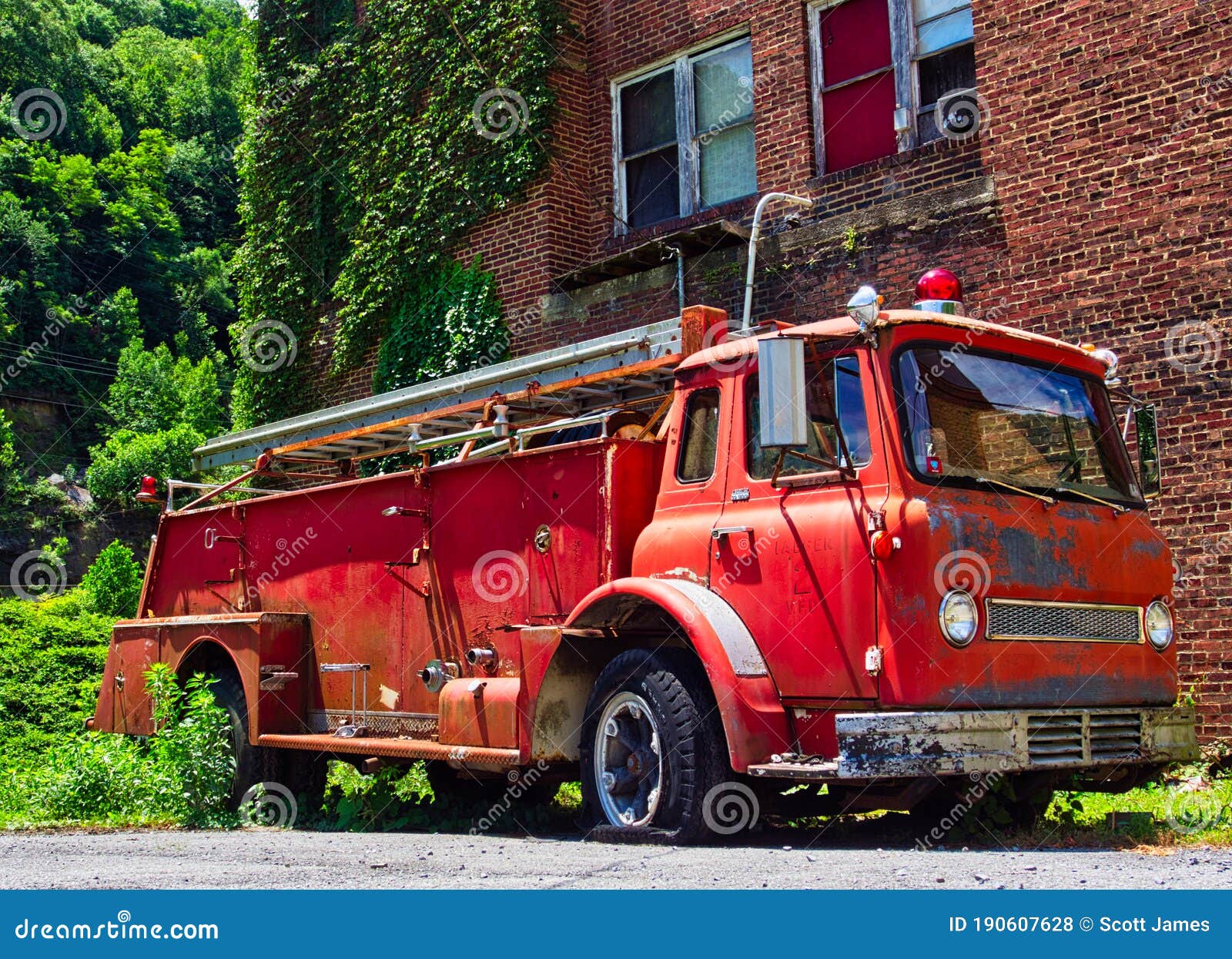 Old abandoned fire engine stock photo. Image of building - 190607628