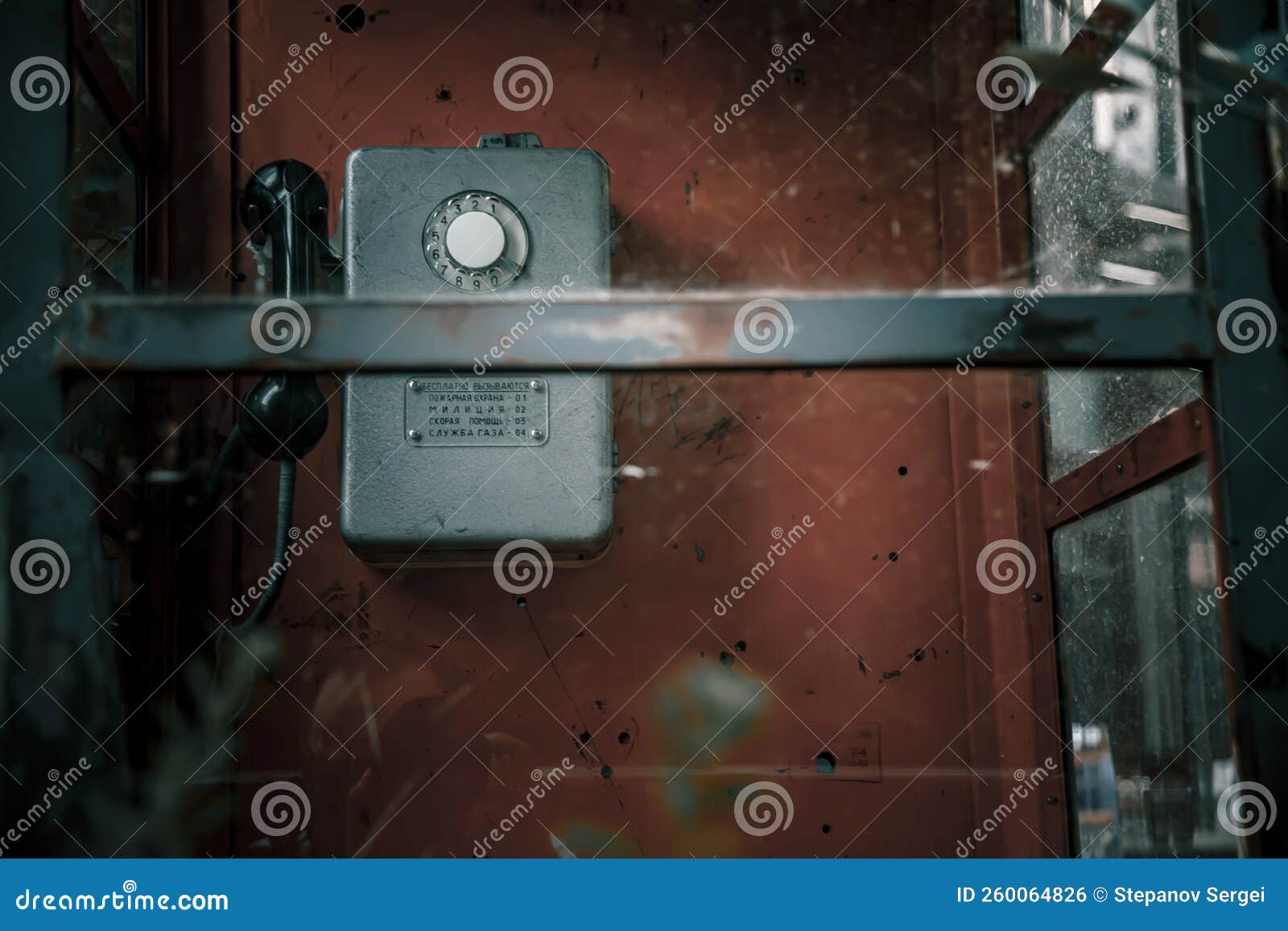 Old Rusty Telephone Booth On Overgrown Tree Street Of Abandoned Ghost ...