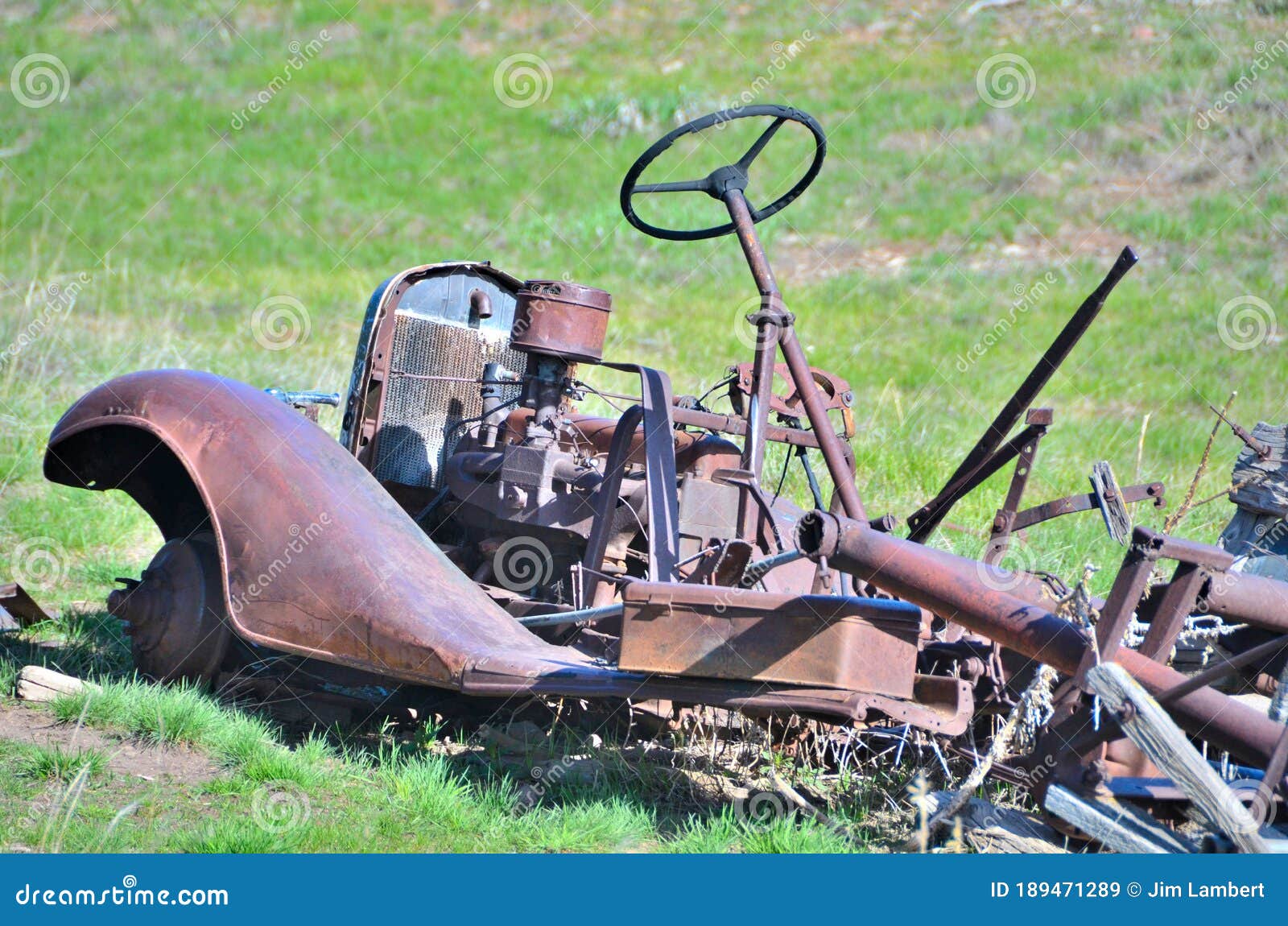 Old Rusted Car Sitting in a Field. Stock Image - Image of junkyard ...
