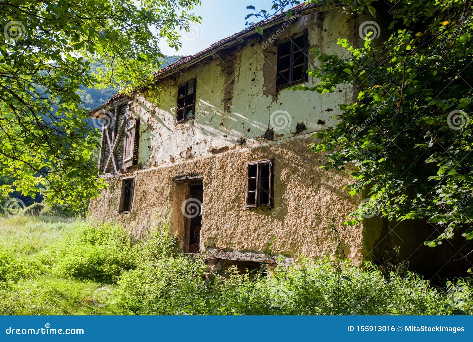 Old Abandoned Rustic Old House With Roof Tiles Stock Photo ...