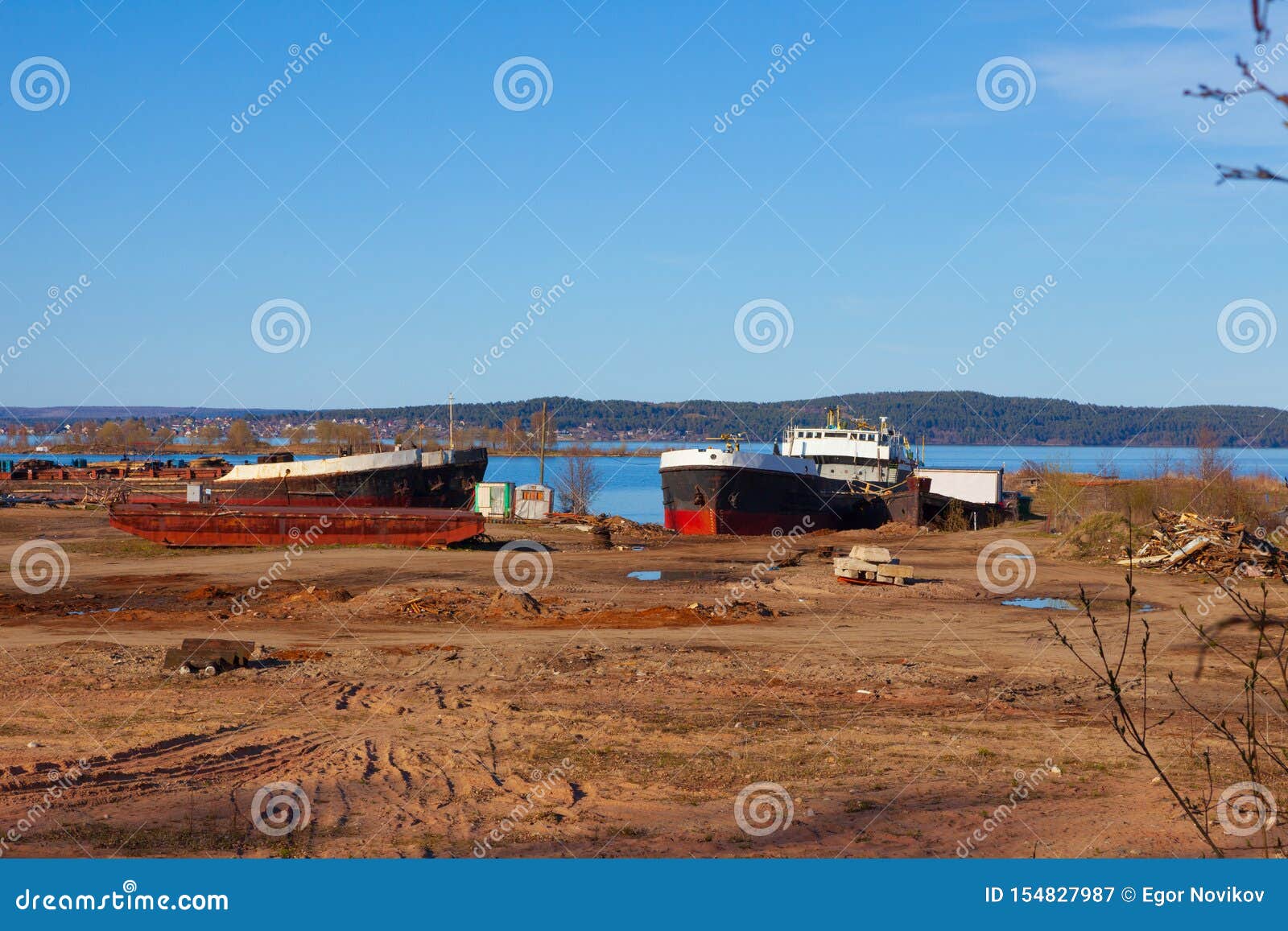 Old, Abandoned Ships In The Port On A Background Of Blue Lake Royalty ...