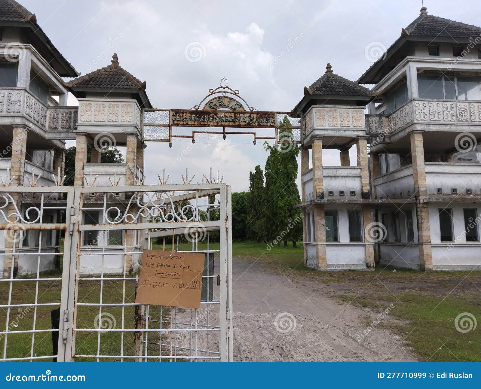 The Old Abandoned and Unkempt Old White Building is Creepy Stock Image ...