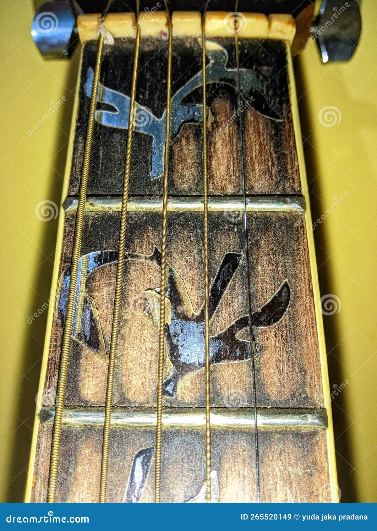 An Old Acoustic Guitar Missing a Guitar String Stock Image - Image of ...